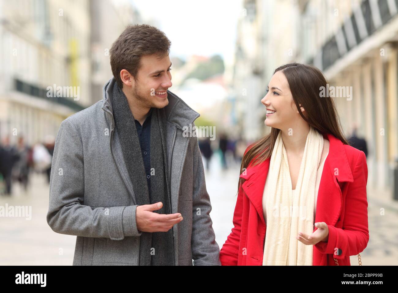 Two people walking towards each other hi-res stock photography and ...