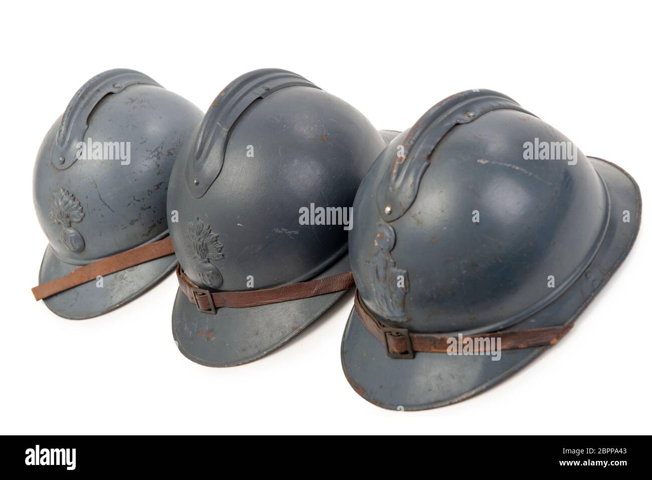 three french military helmets of the First World War isolated on white ...