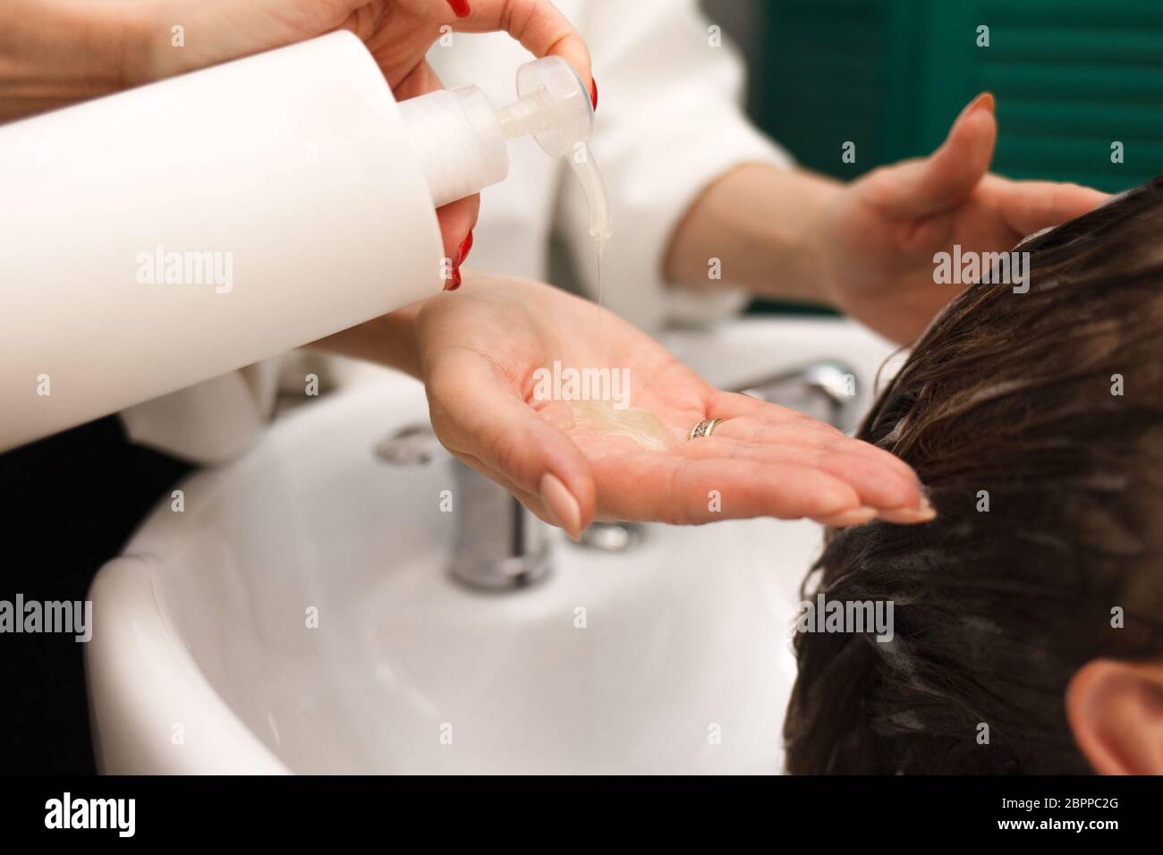 Shampoo pour on head hi-res stock photography and images - Alamy