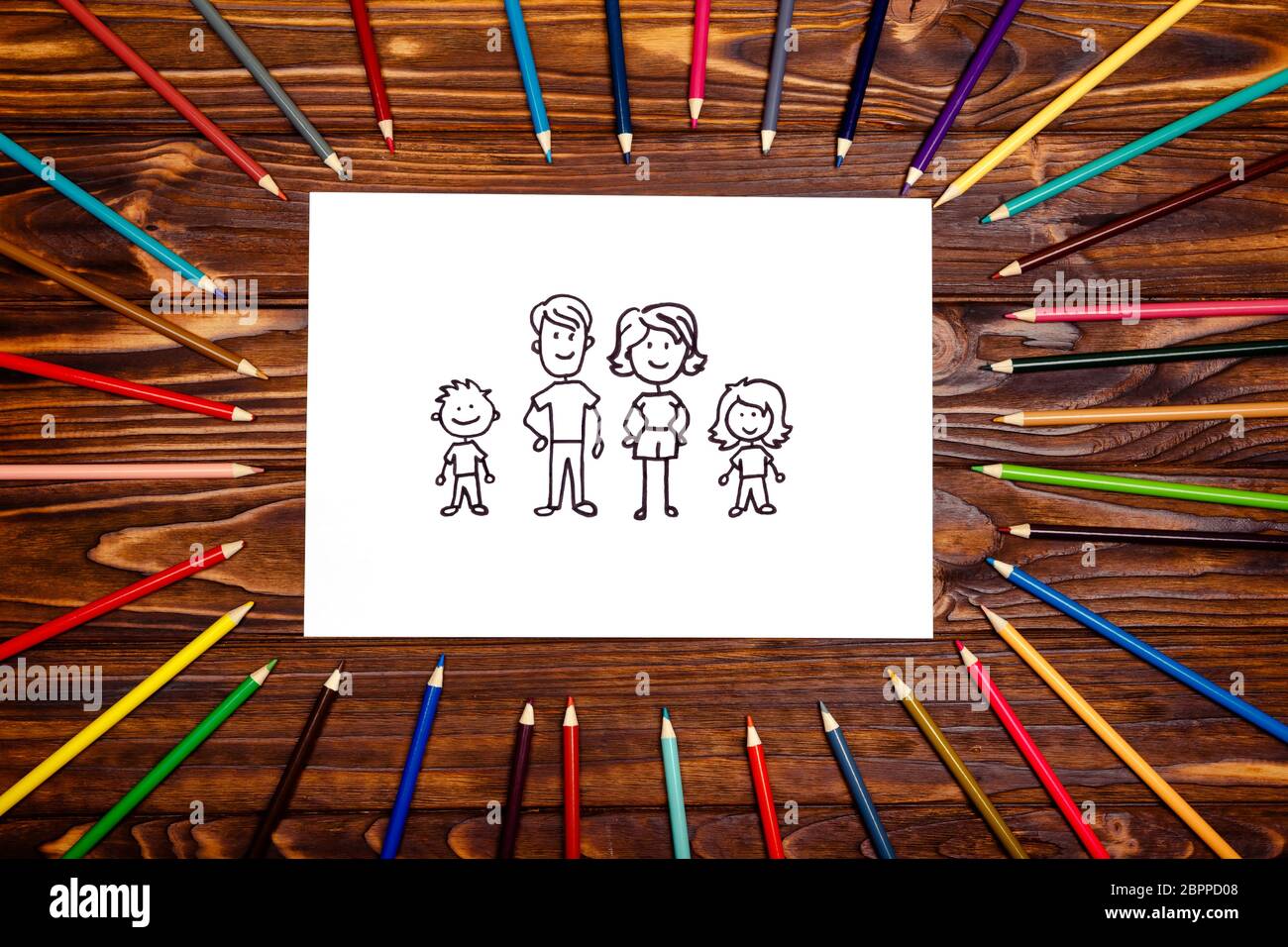 Drawing of a family with a pen on a white background in a frame of ...