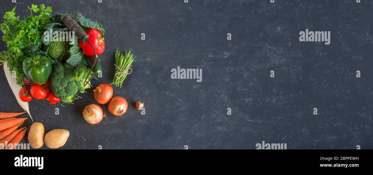 Healthy vegetables selection on a gray slate plate for a backround ...