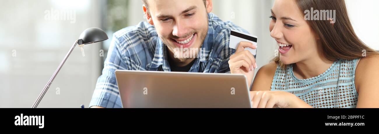 Couple using mobile bank card hi-res stock photography and images - Alamy