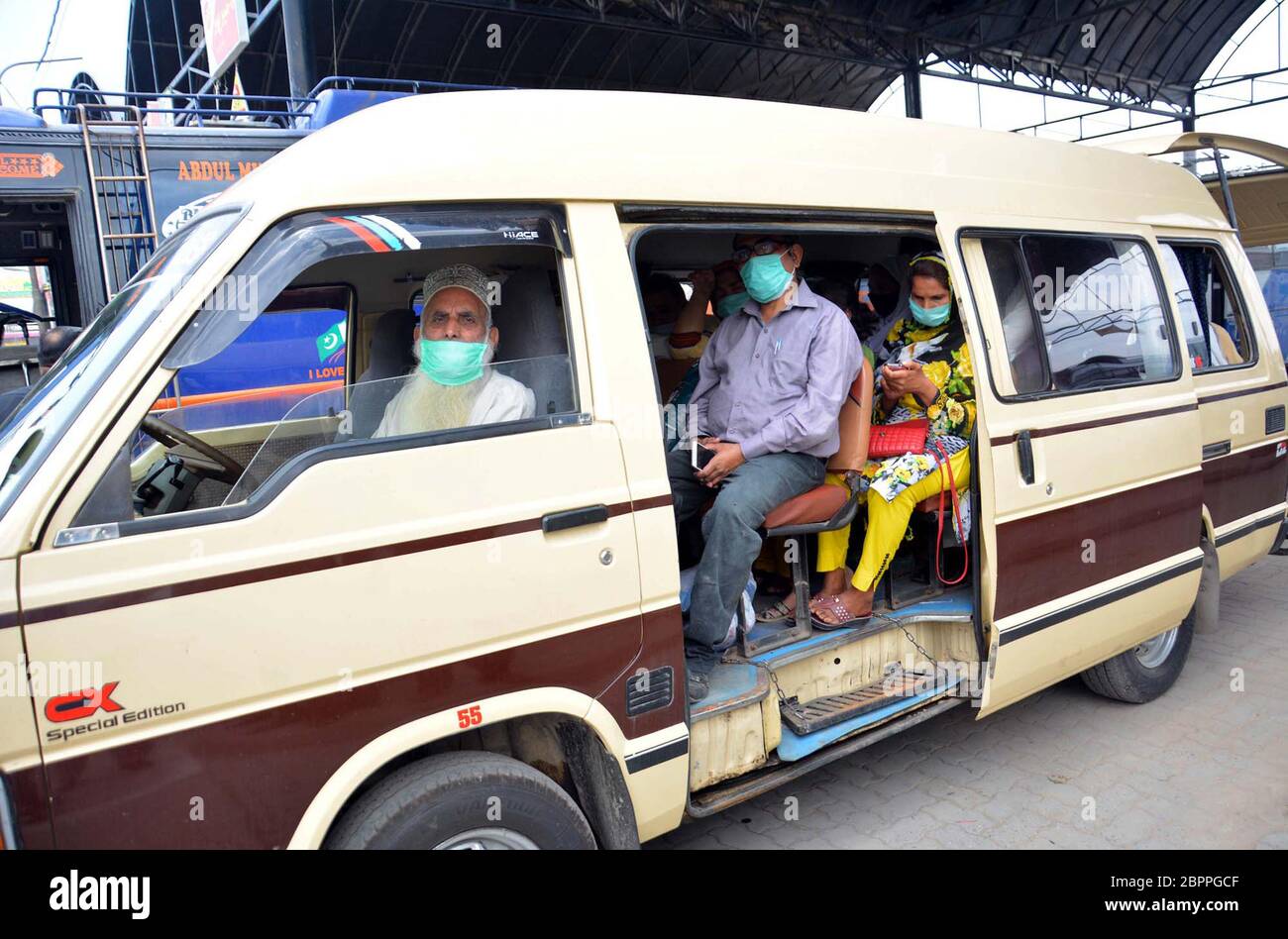 People are boarding on passengers bus as they are going to their native ...