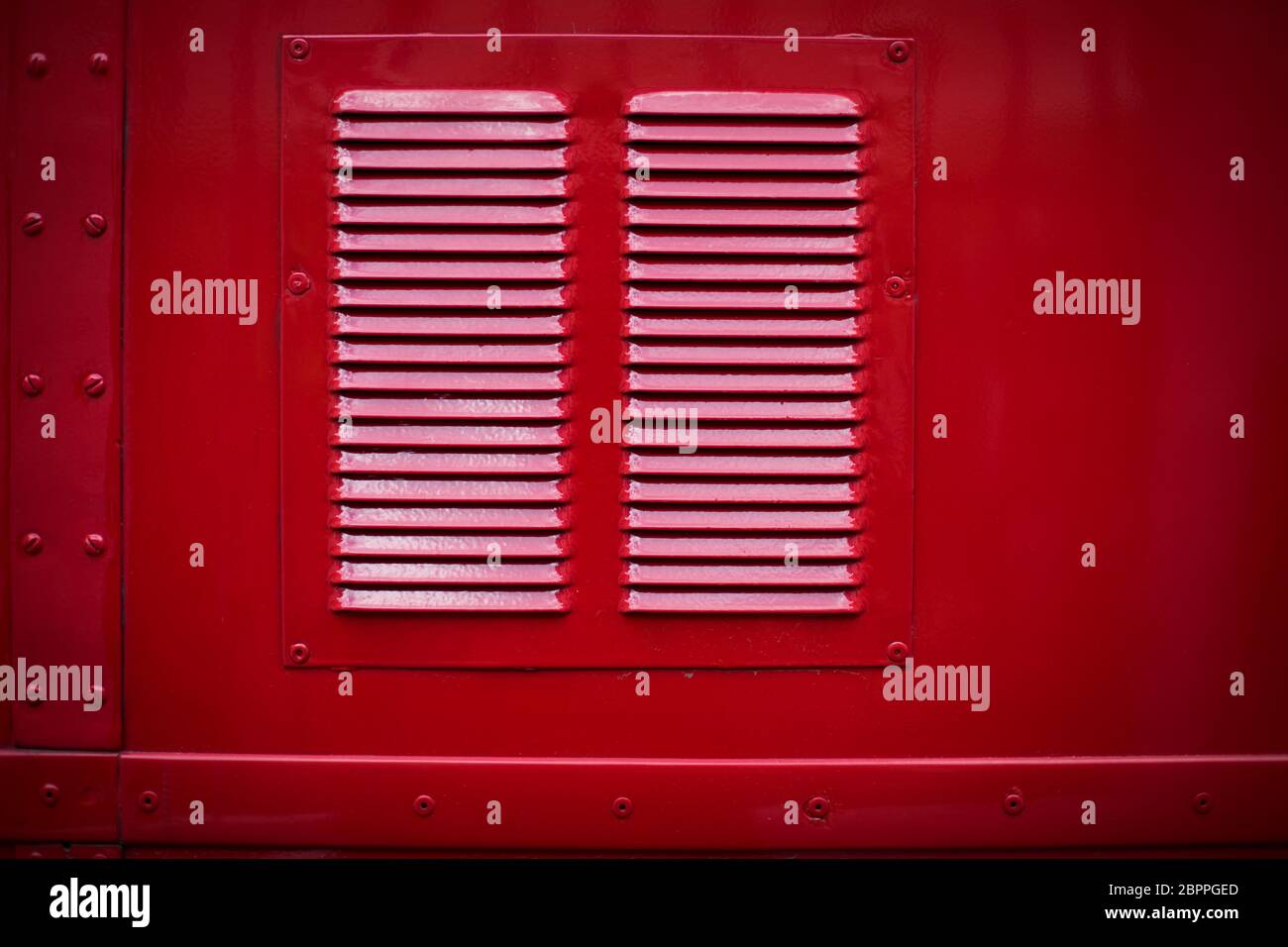 Color image of the air vents of a vintage red bus Stock Photo - Alamy