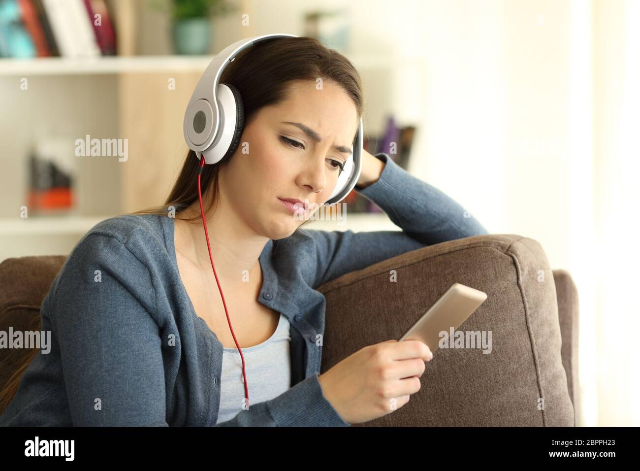 Sad Girl With Headphones