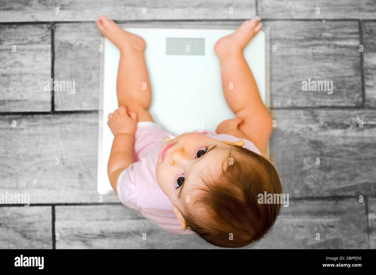 baby weight scale Stock Photo - Alamy
