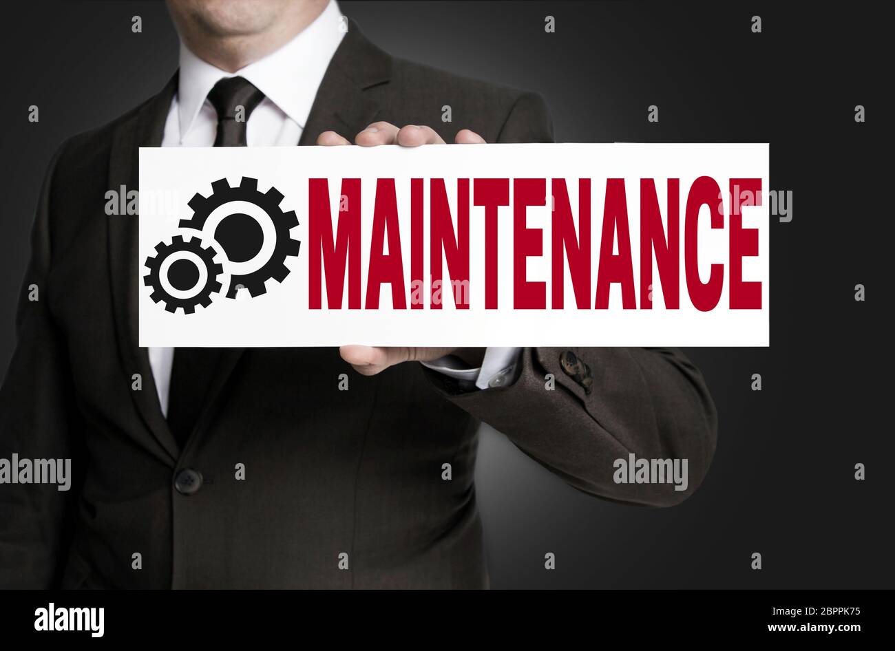 maintenance only sign is held by businessman Stock Photo - Alamy