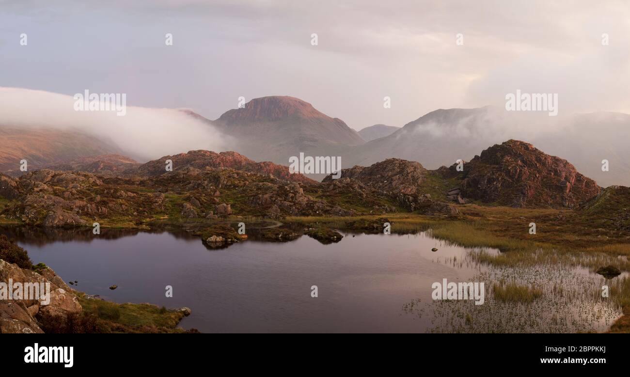 The Wasdale fells from Innominate Tarn on Haystacks, at sunset in the ...