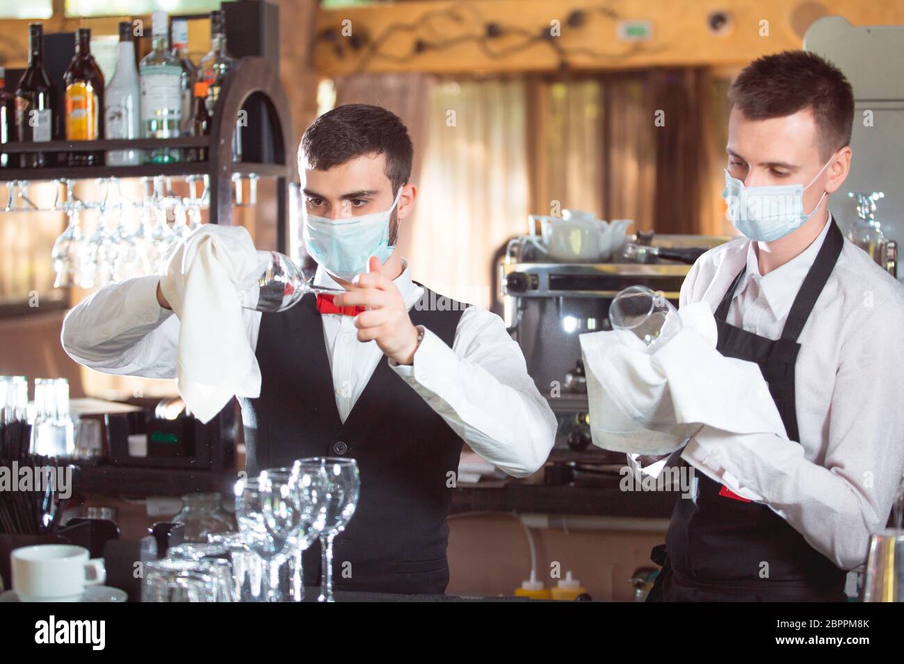 bartender is working at the bar in the restaurant Stock Photo - Alamy