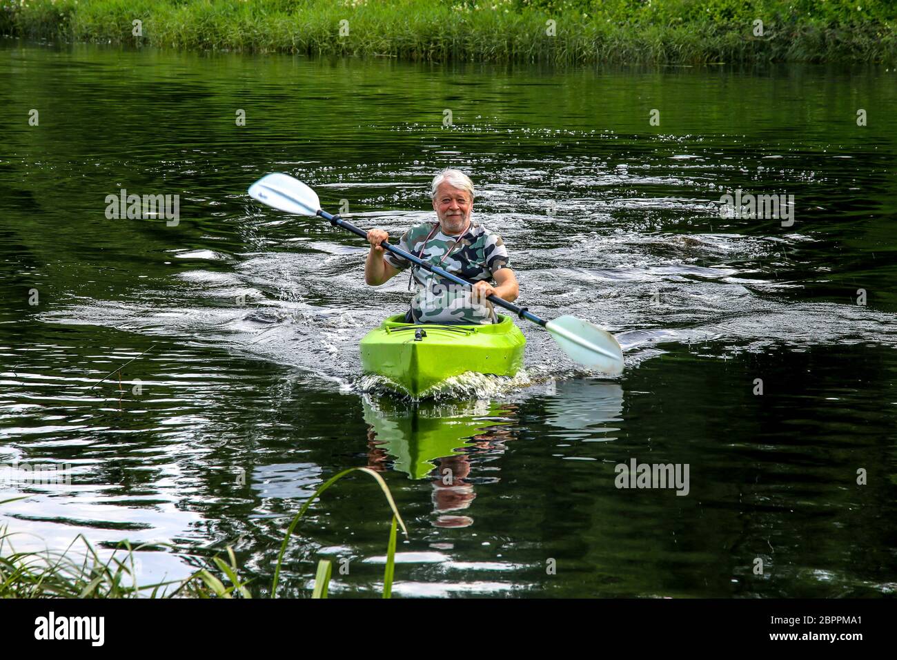 People boating on river Memele in Latvia, peacefull nature scene Stock ...