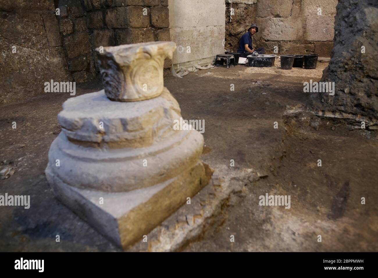 Jerusalem, Israel. 19th May, 2020. An Israeli archaeologist works at an ...