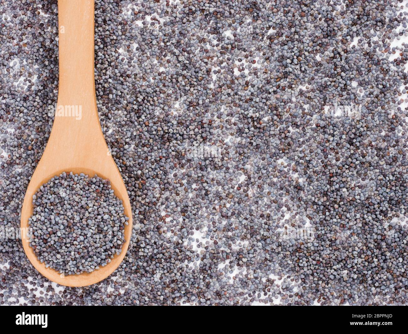 poppy seeds texture as background. Top view or flat lay Stock Photo - Alamy