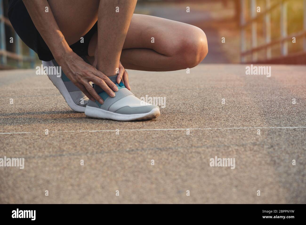 The female clings to a bad leg. The pain in her leg. Healthcare and ...