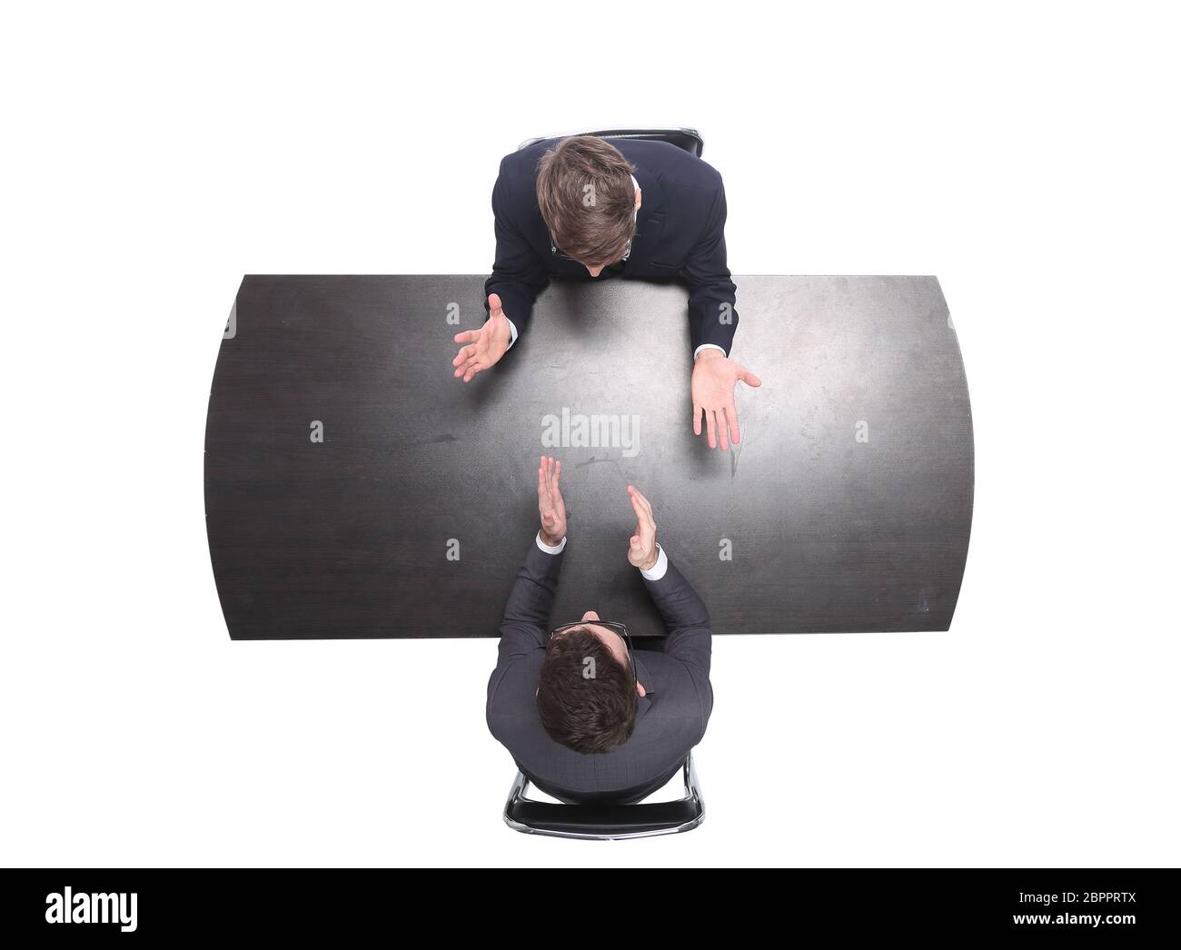 top view. two business people discussing something at a meeting Stock ...