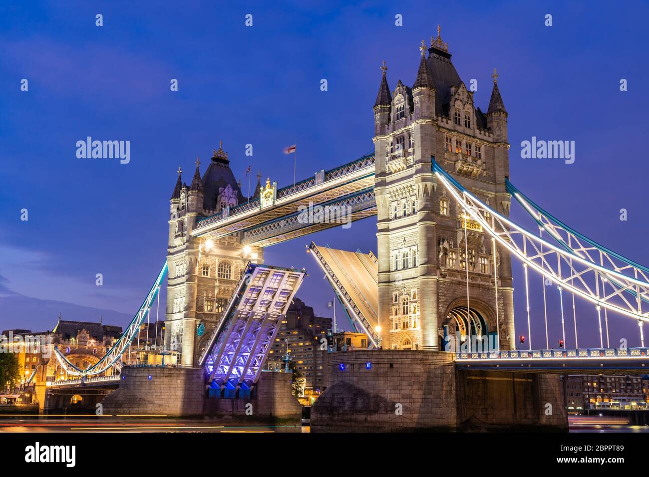 London Tower Bridge lifting up at Sunset dusk, London UK Stock Photo ...