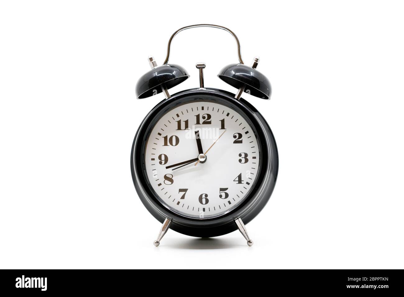 Black alarm clock on white background Stock Photo - Alamy