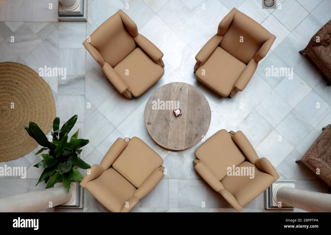 Top view of four chairs around a coffee table Stock Photo - Alamy
