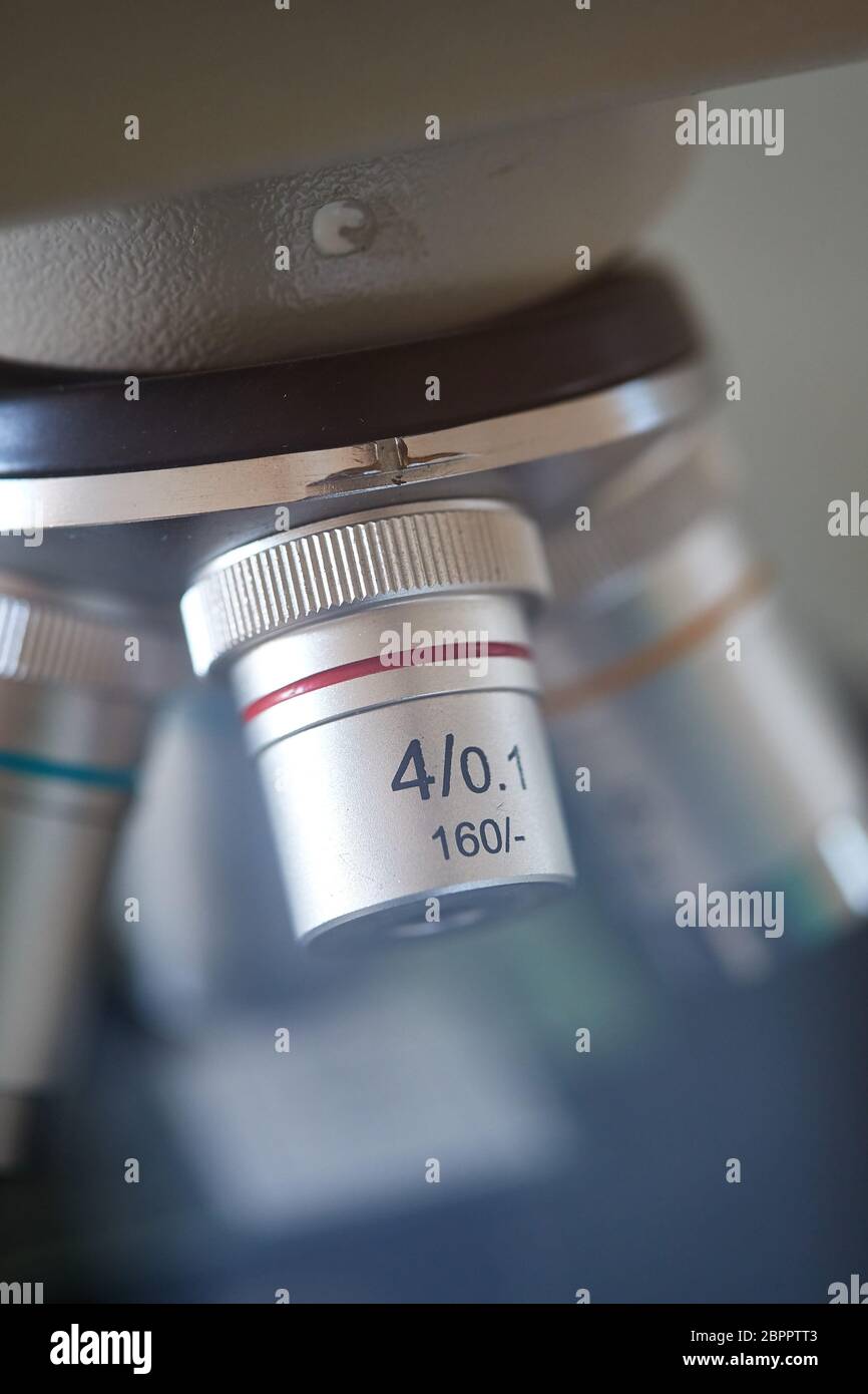 Microscope lens closeup in a lab Stock Photo - Alamy