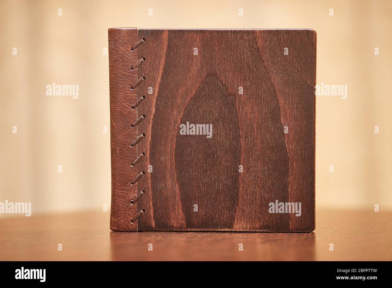 Note book with hard wooden cover Stock Photo - Alamy