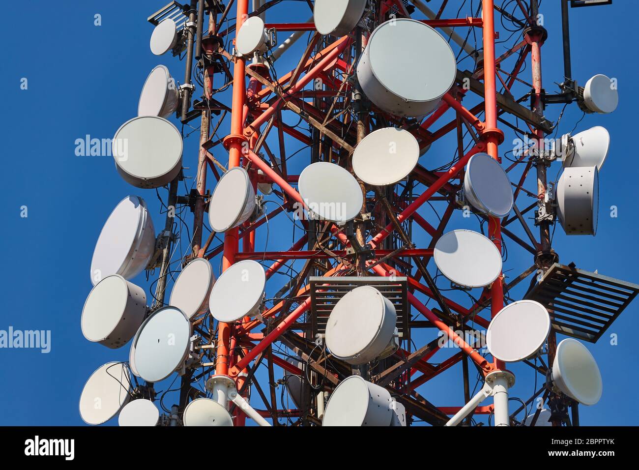 Communication transmitter tower with lots of antennas Stock Photo - Alamy