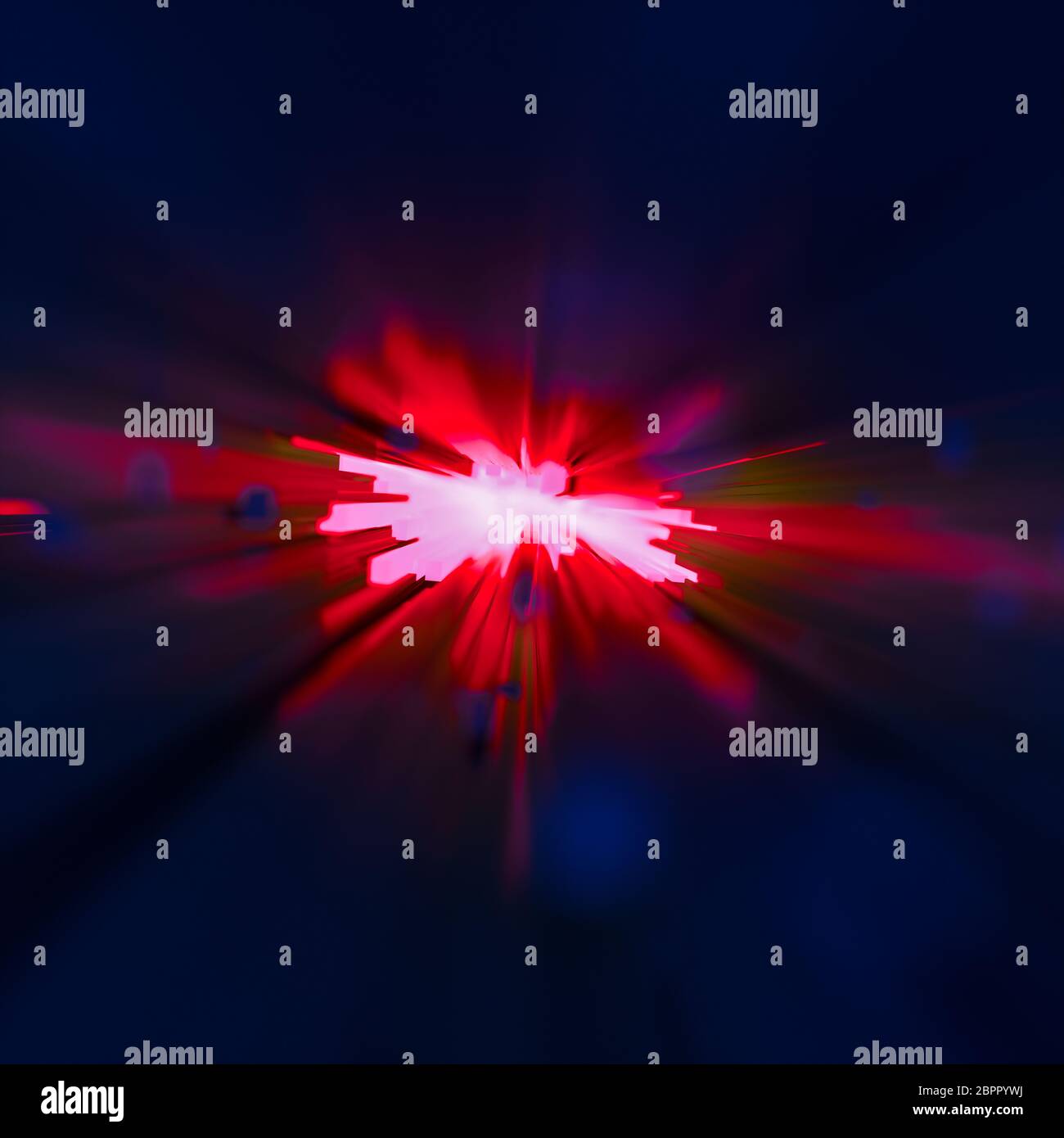 Bright vibrant abstract blast or explosion on a deep blue background ...
