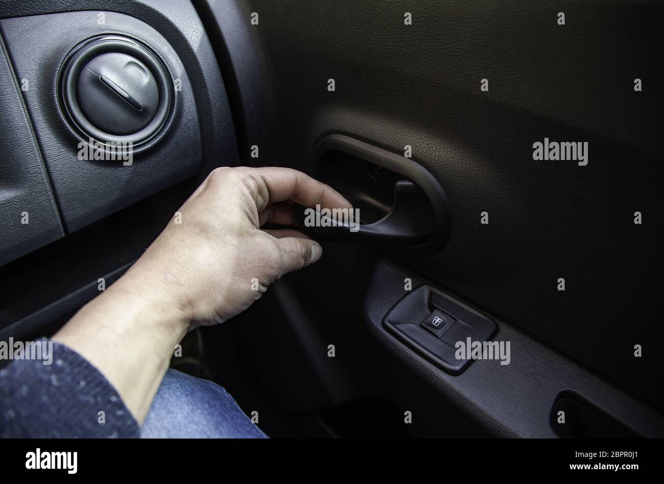 Opening car door, handle detail to open Stock Photo - Alamy
