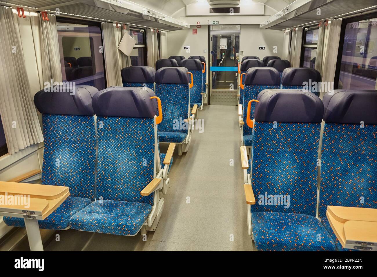 Interior of a passenger train with empty seats Stock Photo - Alamy