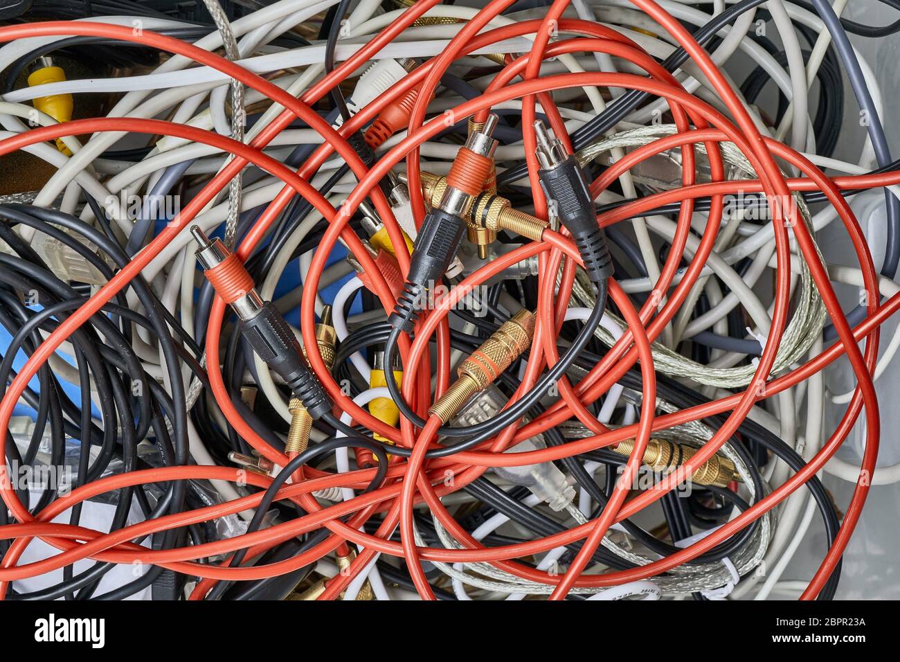 Tangled audio cables in a pile Stock Photo - Alamy