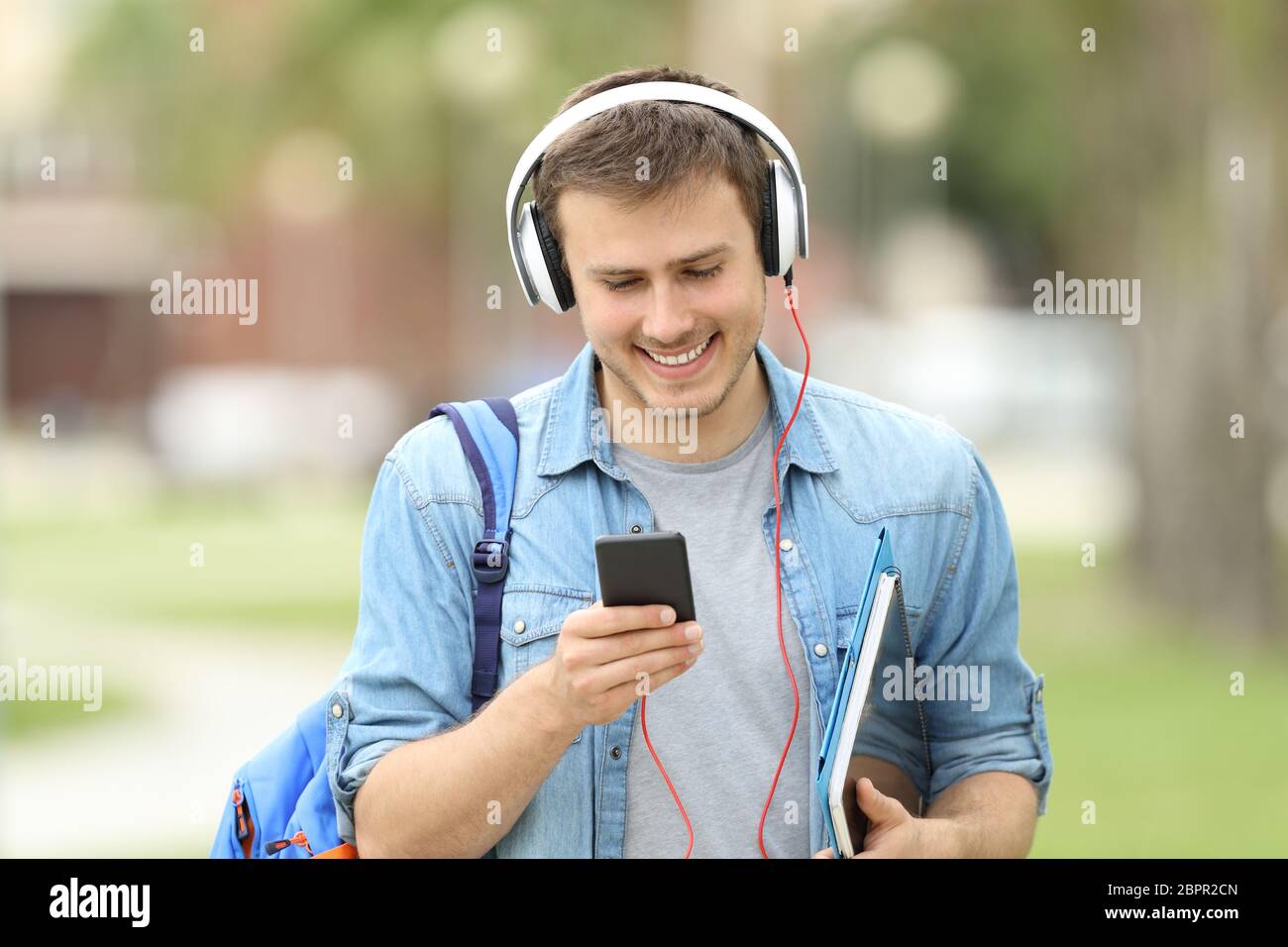 Young boy walking towards camera hi-res stock photography and images ...