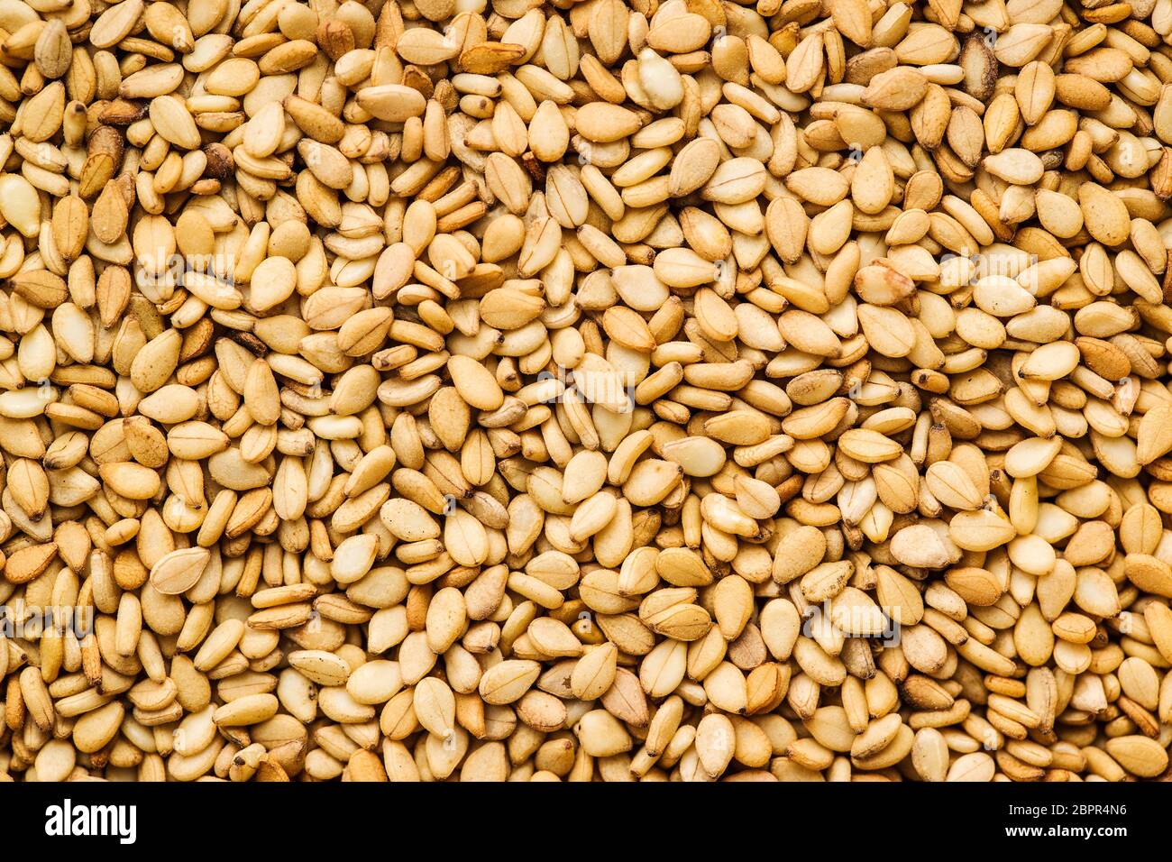 Roasted sesame seeds. Pattern of sesame Stock Photo - Alamy