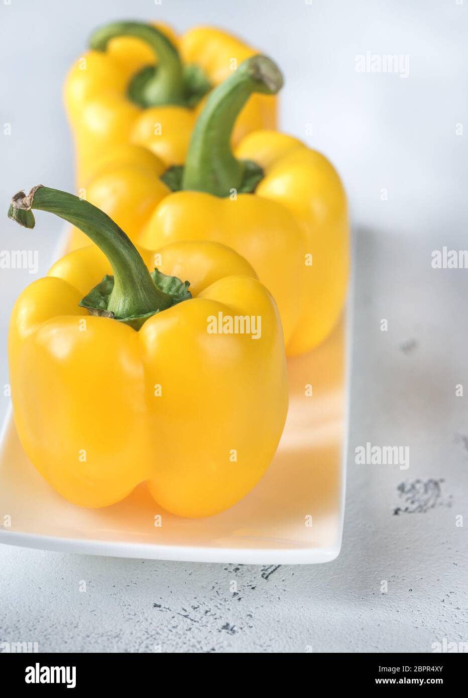 Fresh yellow bell peppers Stock Photo - Alamy