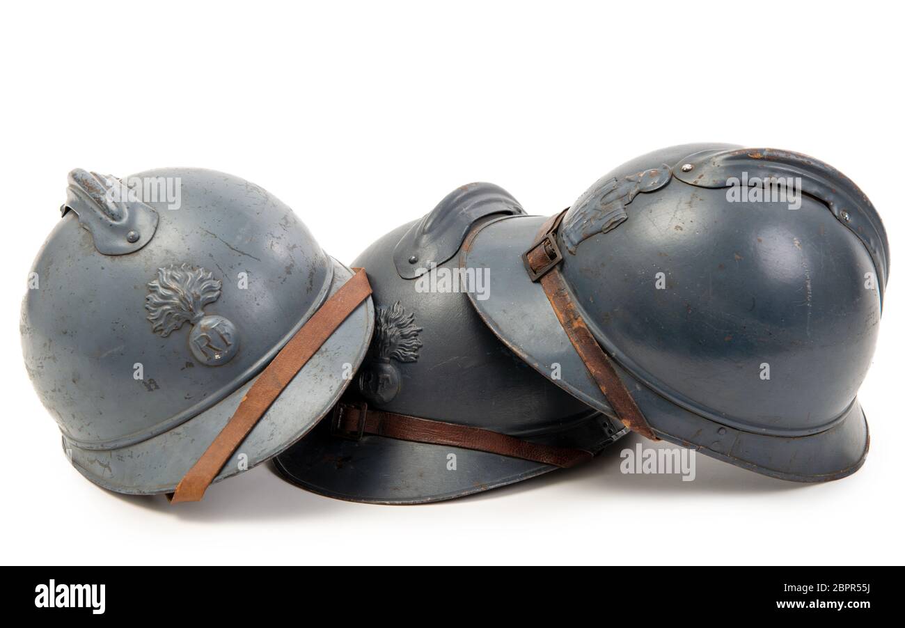 three french military helmets of the First World War isolated on white ...