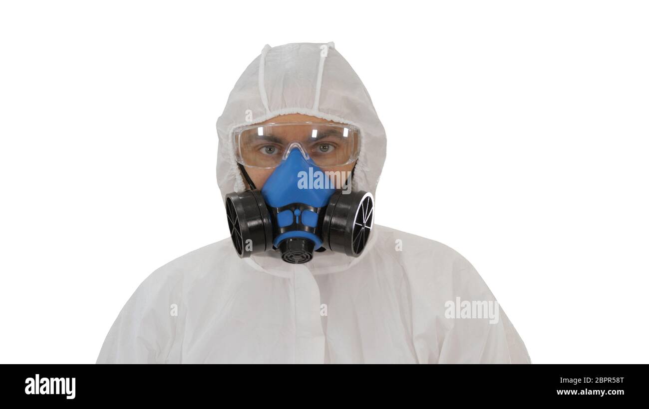Person wearing a hazmat suit and mask walking on white background Stock ...