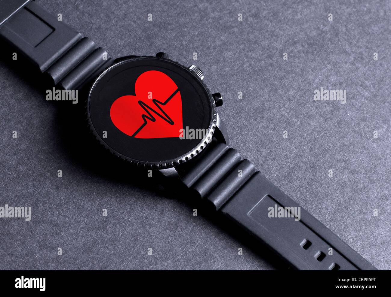 Black smartwatch isolated, measuring a heartbeat, isolated on black ...