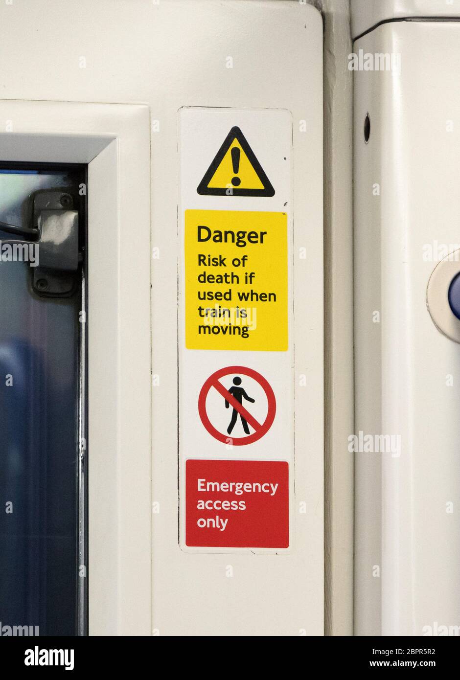 Warning on a door in the London underground, selective focus Stock ...