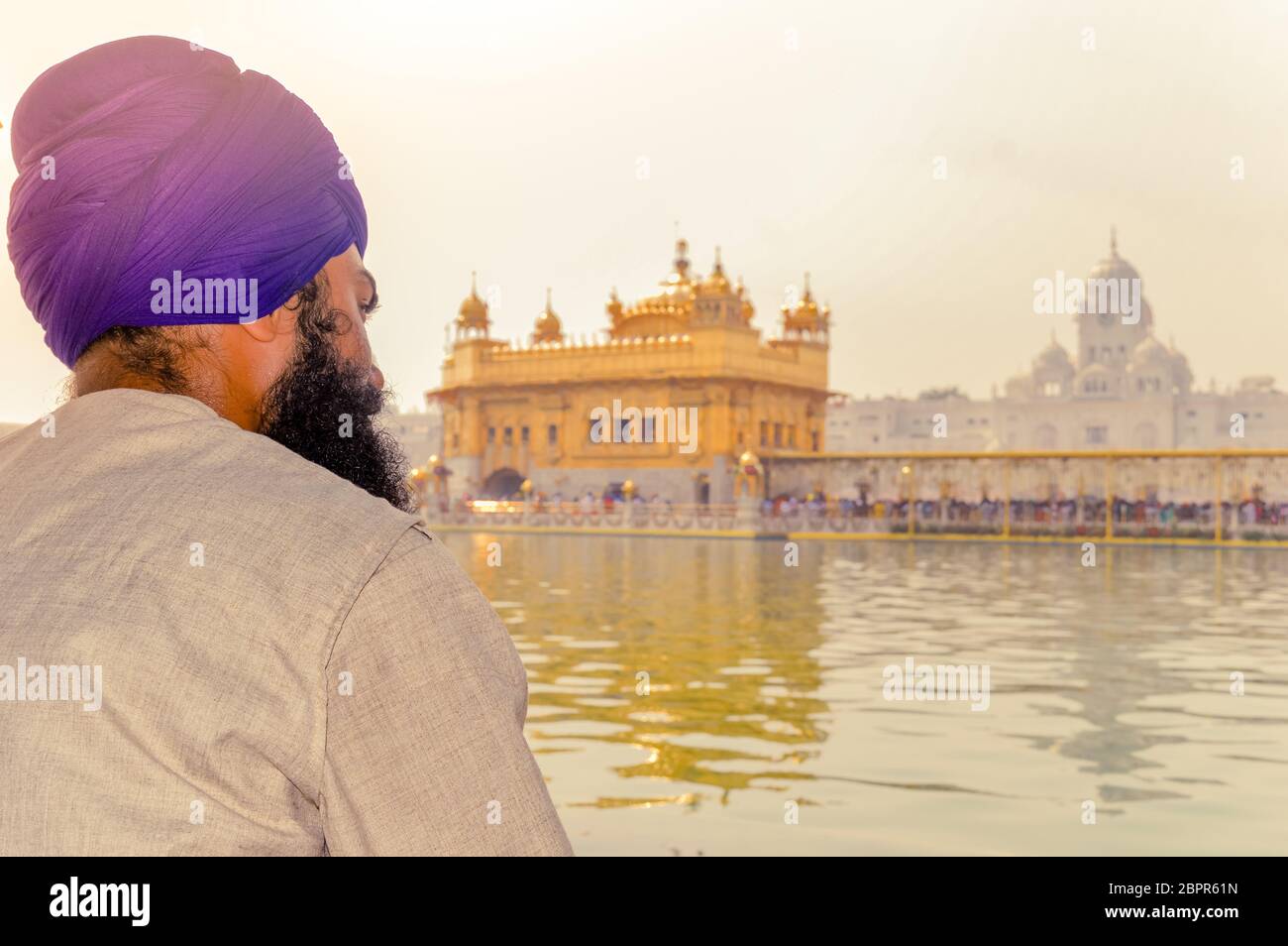 Unidentifiable Punjabi Sikh pilgrim devotee "Nihang Warrior" sitting by ...