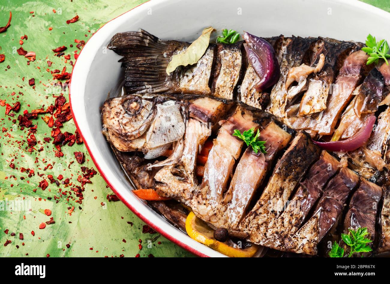 Grilled whole fish loaded with citrus, herbs and spices in baked fish ...