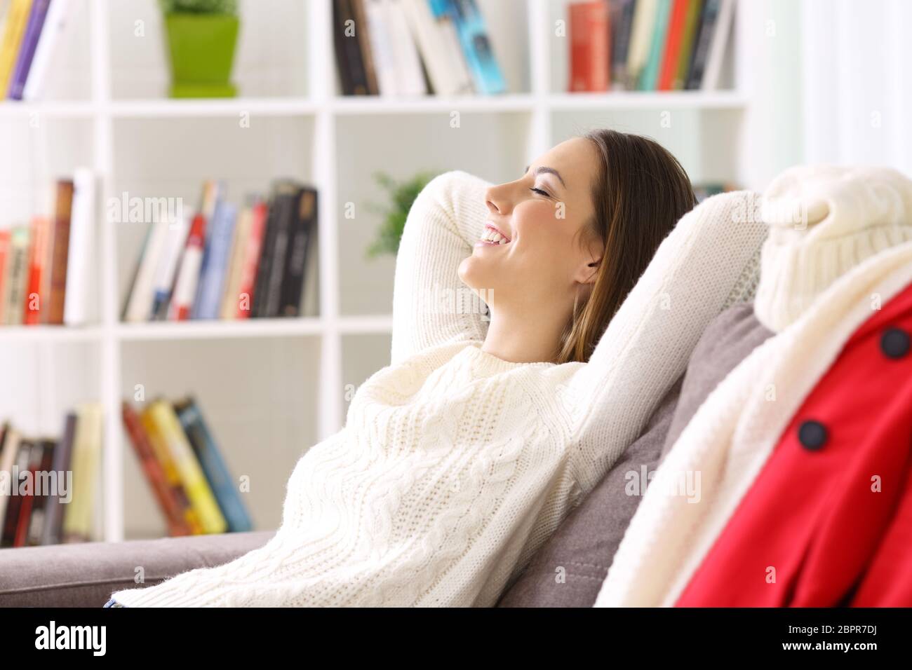 Woman being lazy on sofa hi-res stock photography and images - Alamy