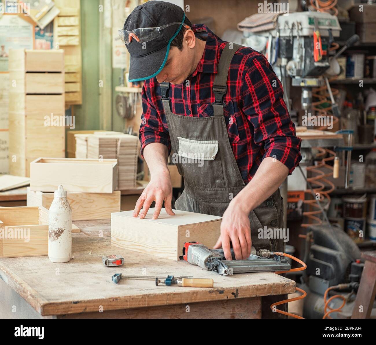 Worker makes measurements wooden hi-res stock photography and images ...