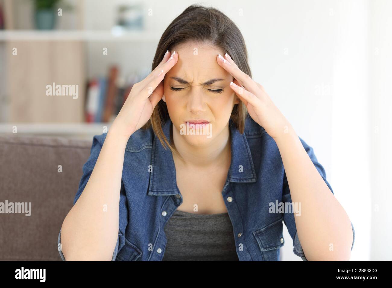 Headache ache aching hands on head hi-res stock photography and images ...