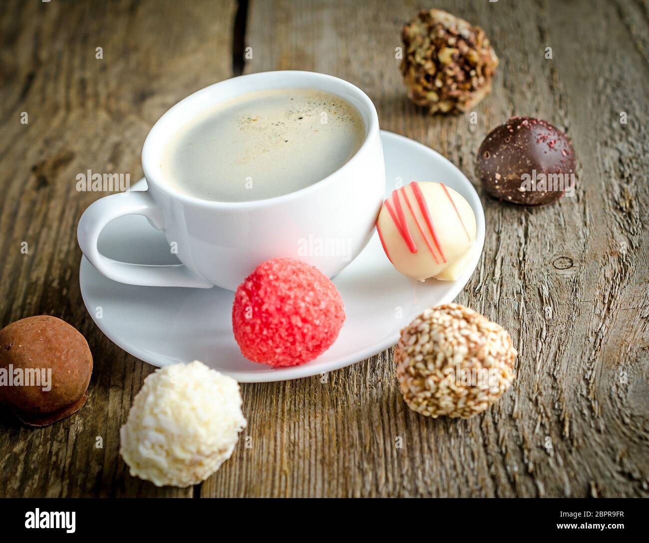 Luxury chocolate candies and cup of coffee Stock Photo - Alamy