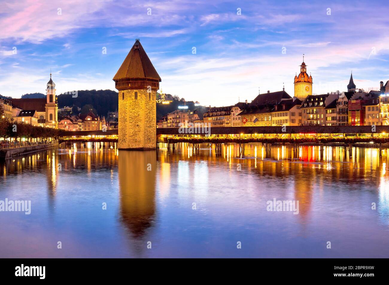 Luzern Kapelbrucke and riverfront architecture famous Swiss landmarks ...