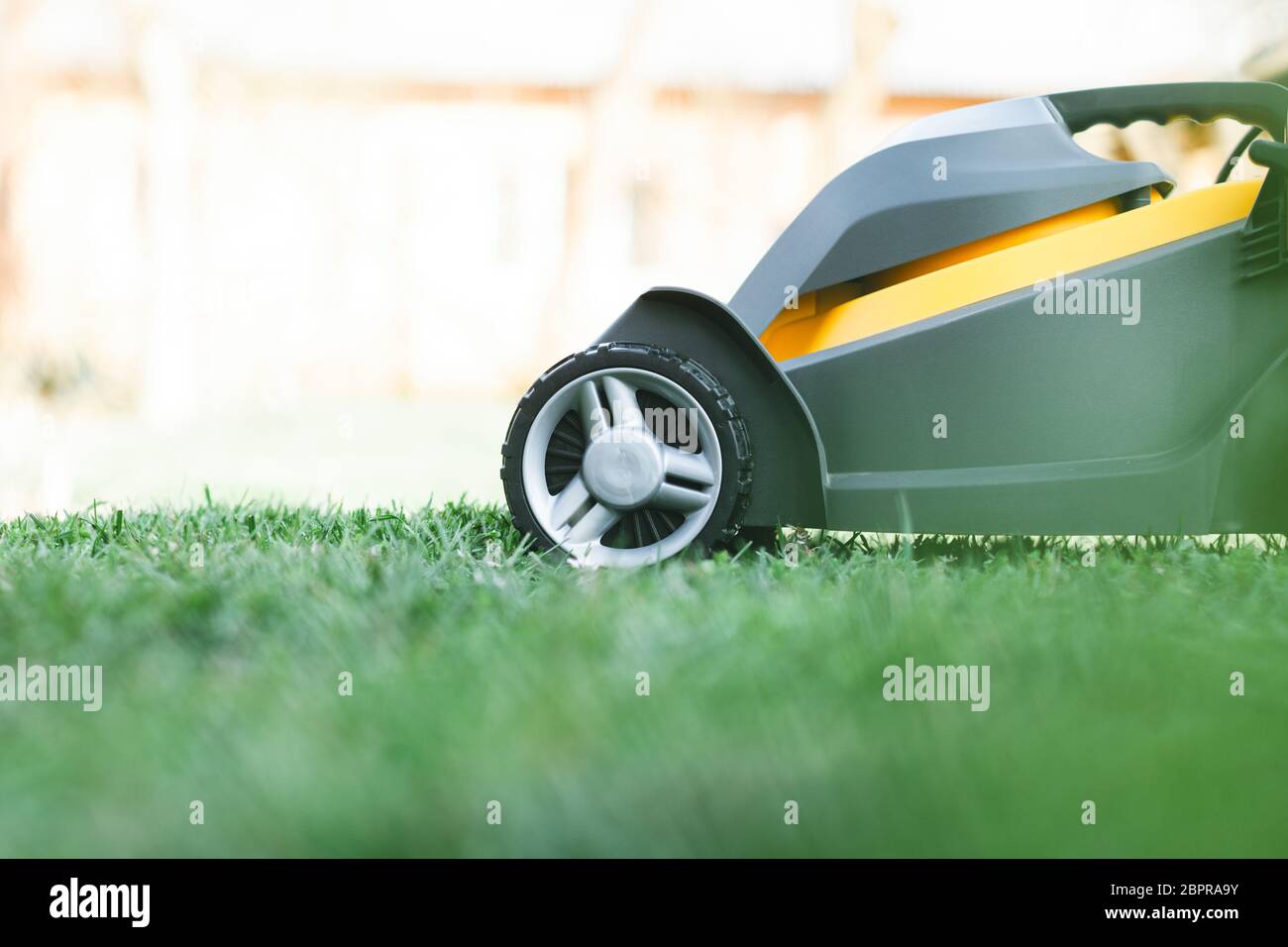 Front view of a lawn mower Stock Photo - Alamy