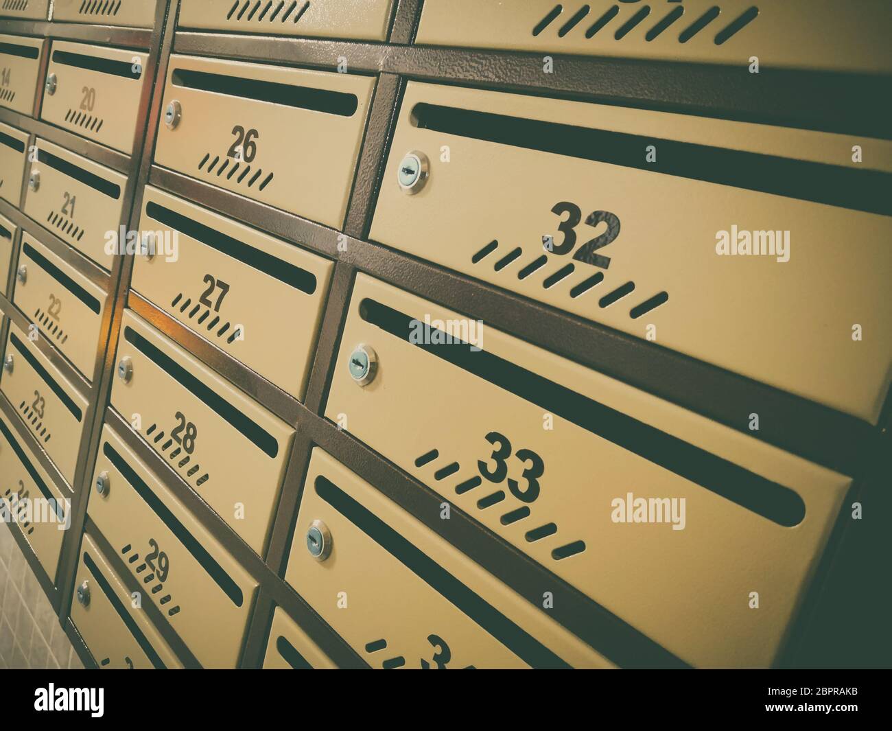 Color image of some postal boxes on a wall Stock Photo - Alamy