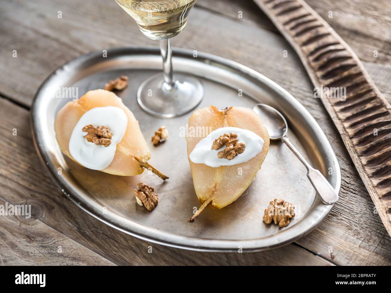 Halves poached pear hi-res stock photography and images - Alamy