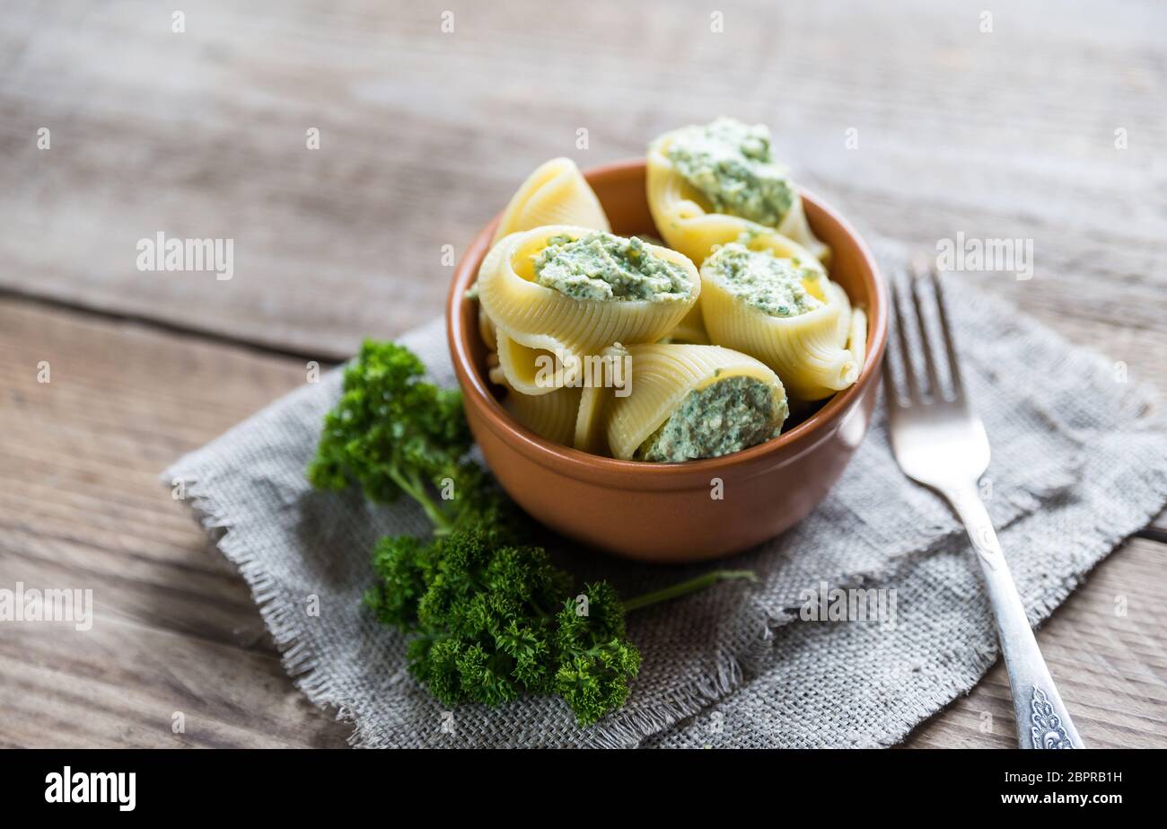 Stuffed lumaconi with cheese Stock Photo - Alamy