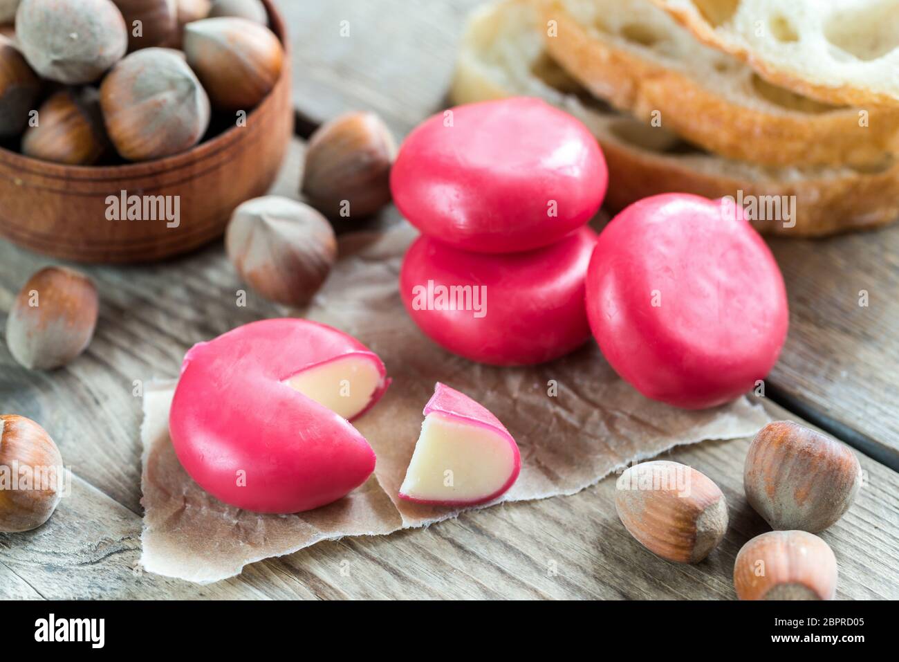 Stack of mini cheese with fuet slices and hazelnuts Stock Photo - Alamy