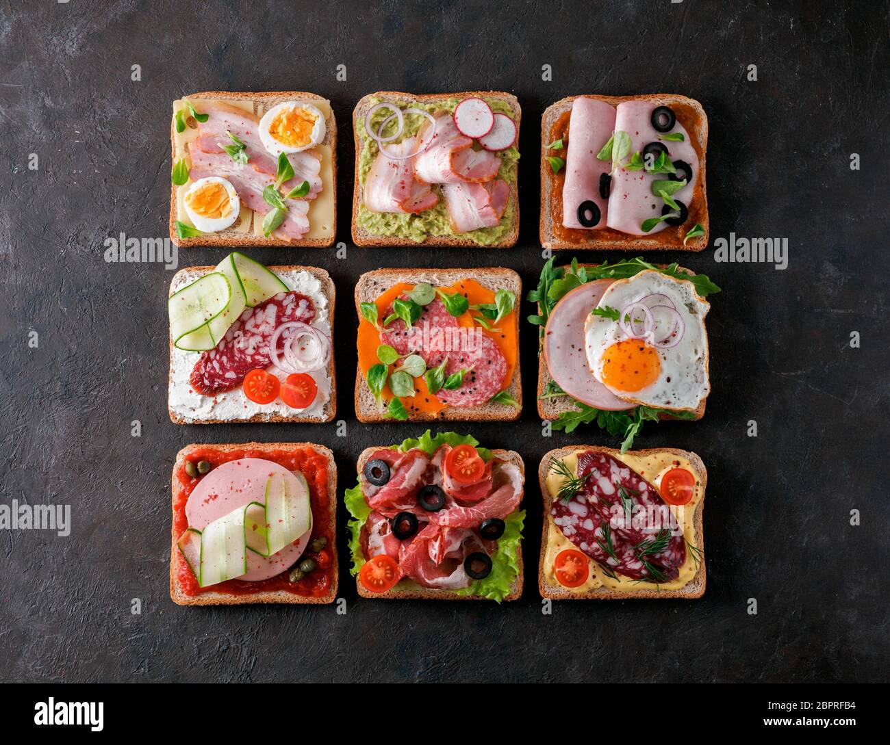 Set of eight different sandwiches with meat in square shape. Top view ...