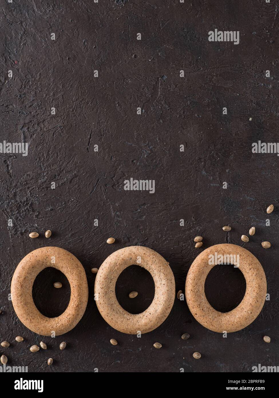 Ring-shaped cracknel with whole grain hemp seed flour and hemp seeds on ...