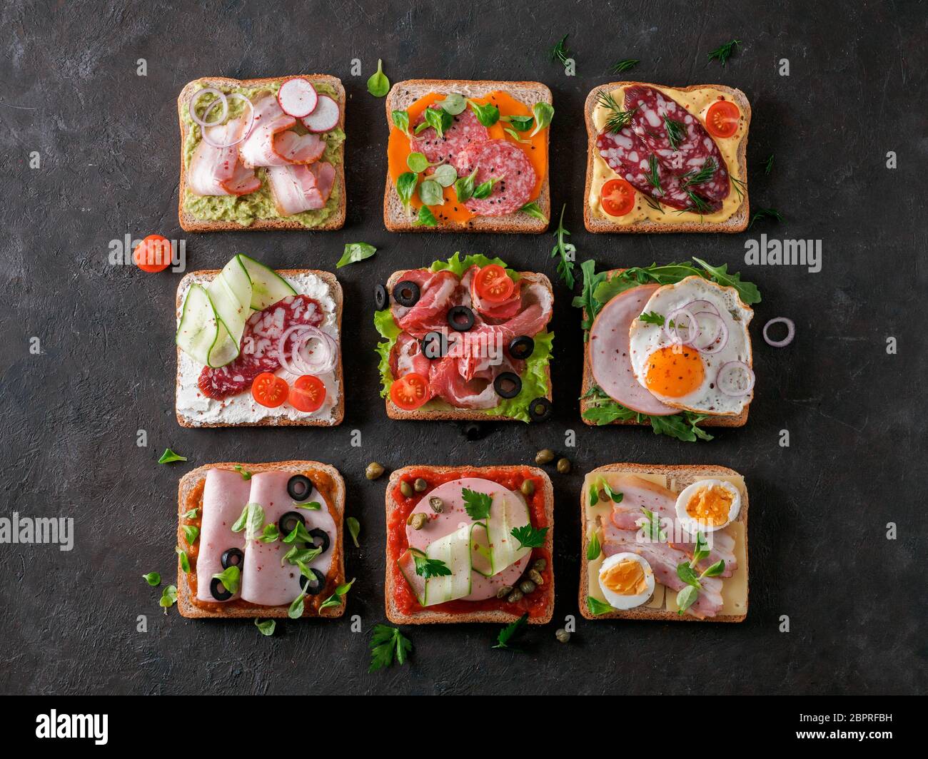 Set of eight different sandwiches with meat in square shape. Top view ...